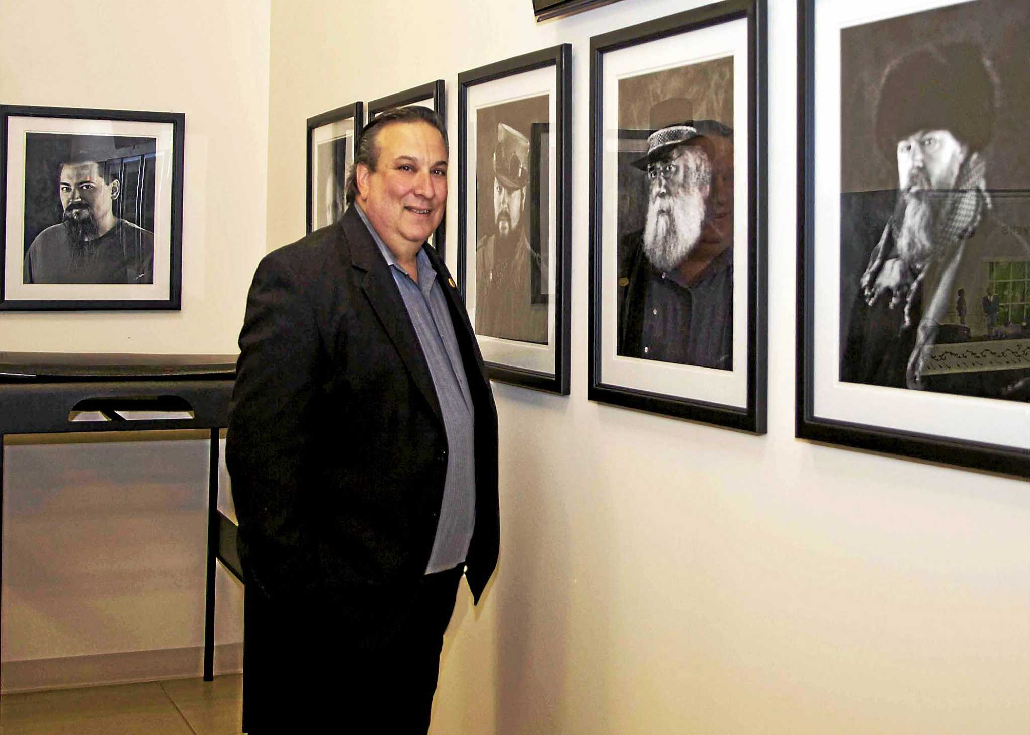 Milford photo exhibit of bearded gents brings help for the homeless