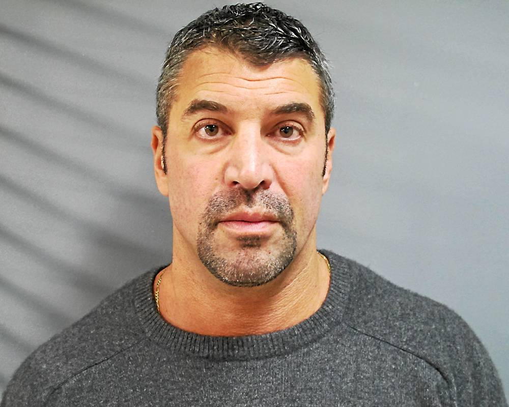 Former Madison police officer accused of lifting weights while ...