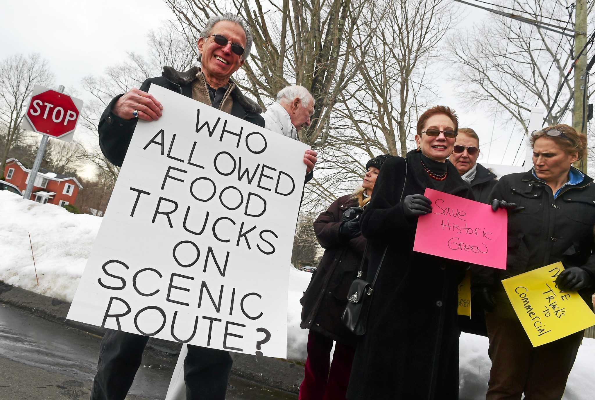 20 protest food trucks in Madison center