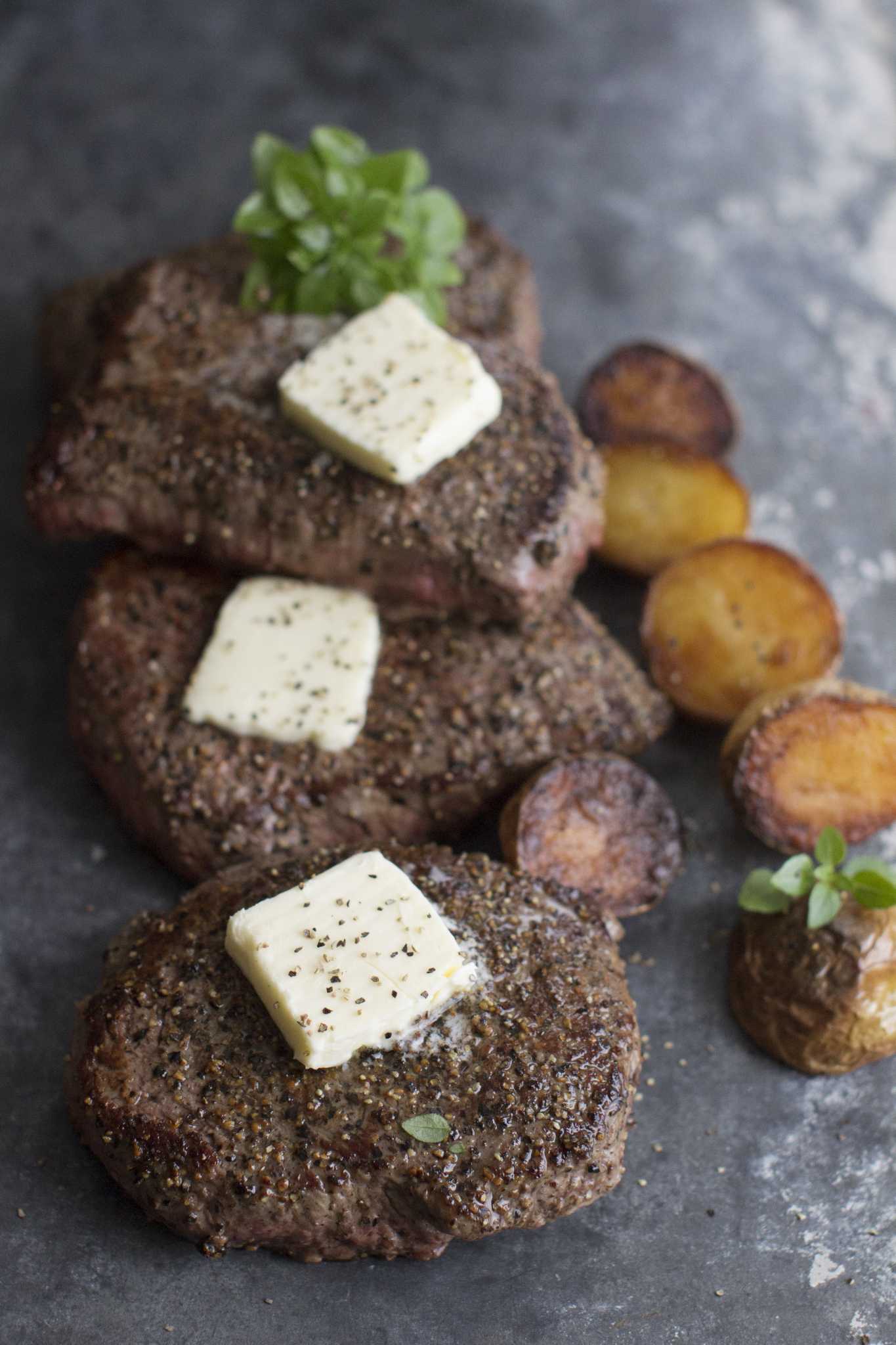 Sit down to Buttered Black Pepper Bison Steaks any night this week