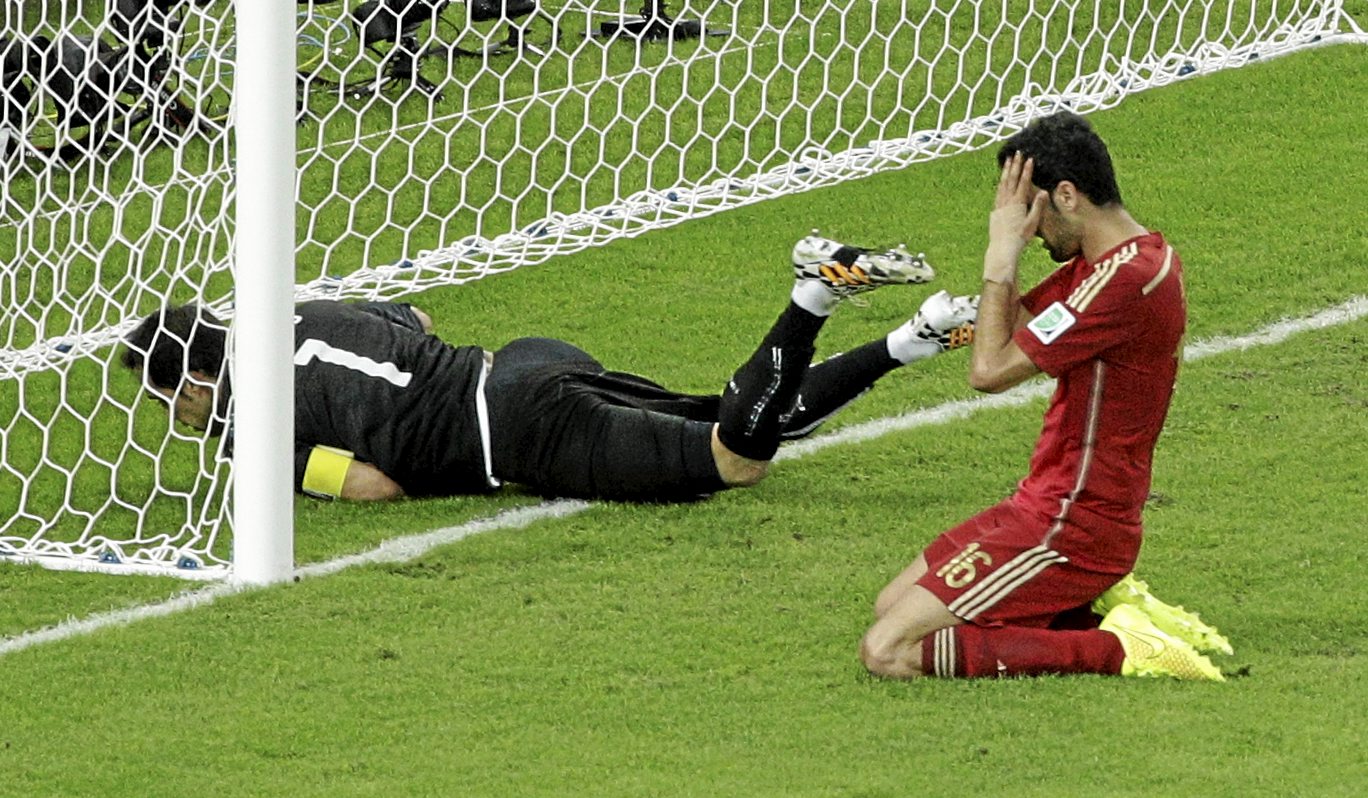 Defending champion Spain ousted from World Cup by Chile