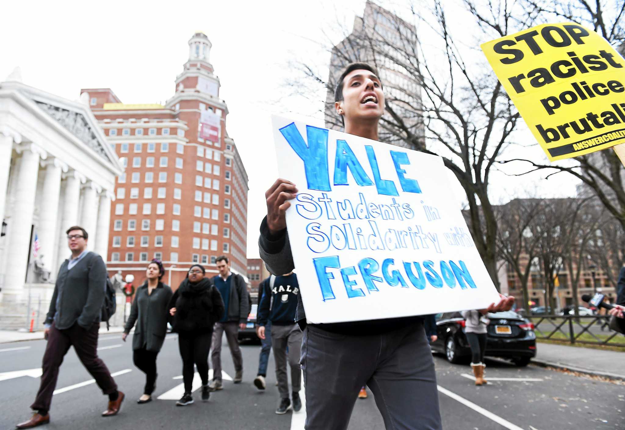 Hundreds march from Yale to New Haven City Hall to protest Brown case