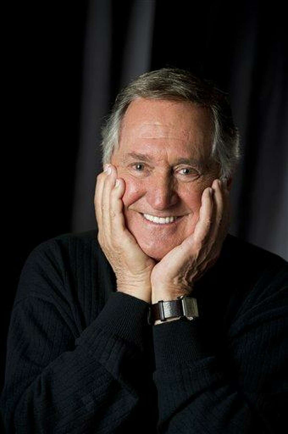 Neil Sedaka turns his calendar girl into dino pet