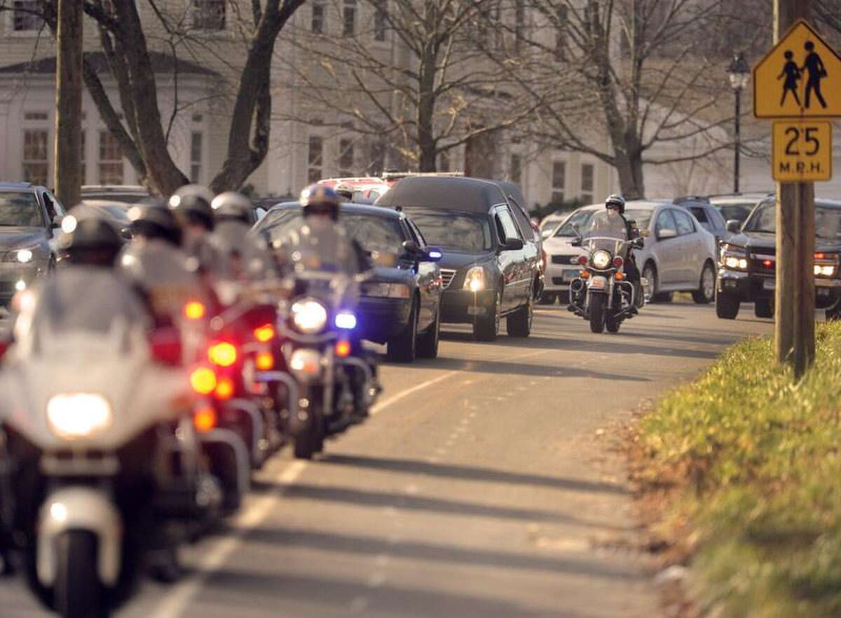 Mourners wear pink to honor Caroline Previdi at her funeral