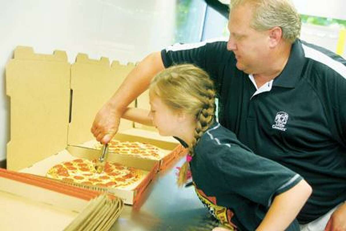 Little Caesars Love Kitchen visits Karing Kitchen in Oneida
