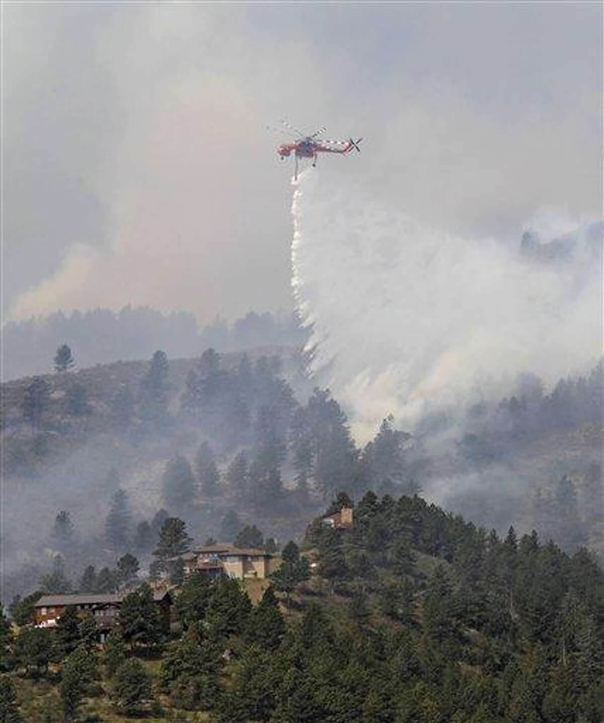 Colorado wildfire forces more evacuations (photos, video)
