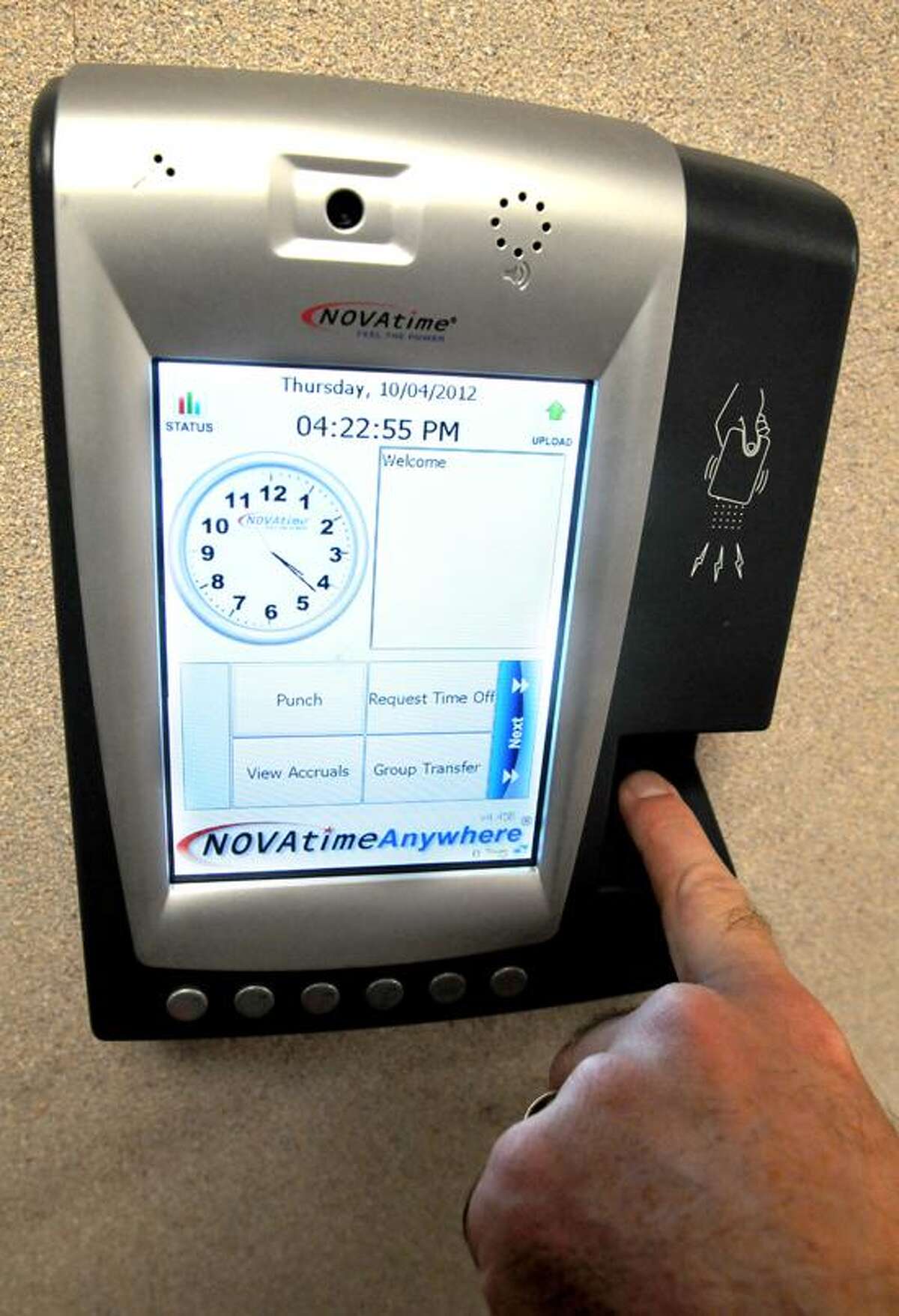 New West Haven time clocks scan fingerprint, not paper
