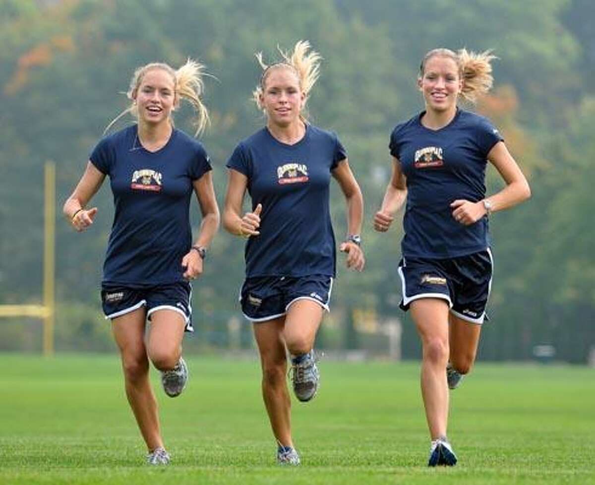 Three of a Kind: Quinnipiac triplets push each other to new heights