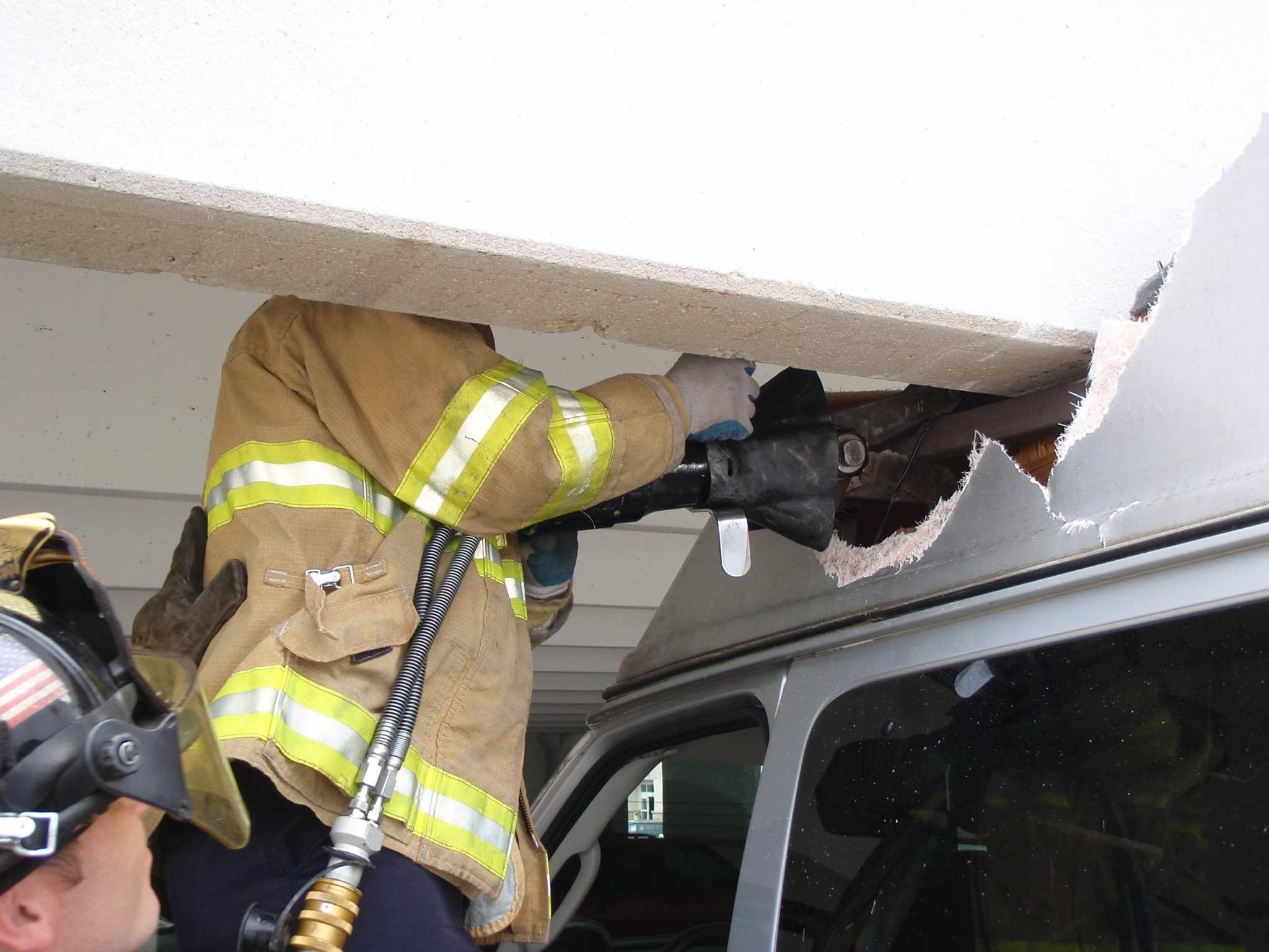 Driver gets van stuck at mall parking garage