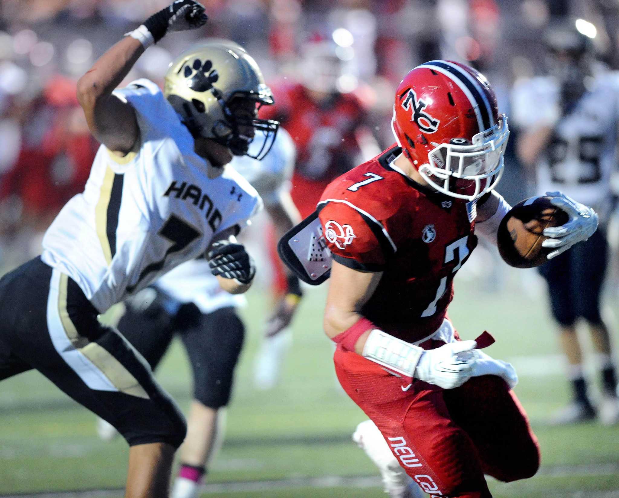 Photos: New Canaan destroys Daniel Hand 50 - 20