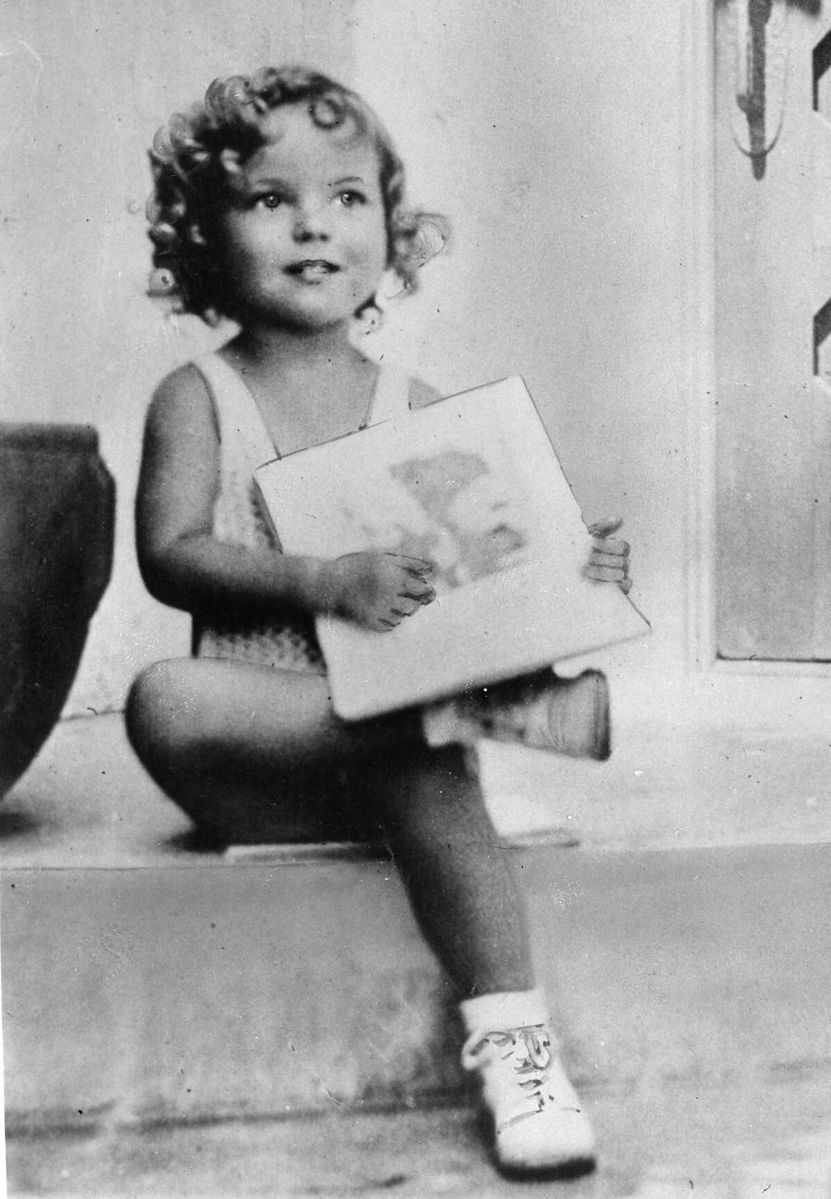 Photos: Shirley Temple, iconic child star, dies at 85