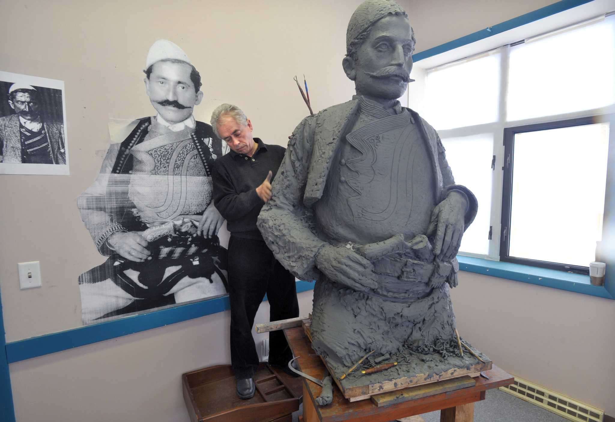 Photos of Vasil Rakaj Sculpting Memorial to Albanian Patriot, Derby