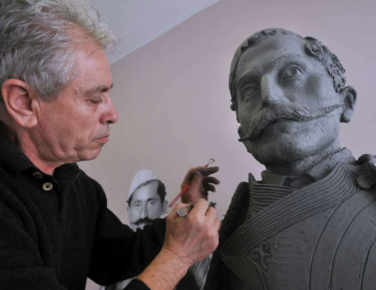 Photos of Vasil Rakaj Sculpting Memorial to Albanian Patriot, Derby