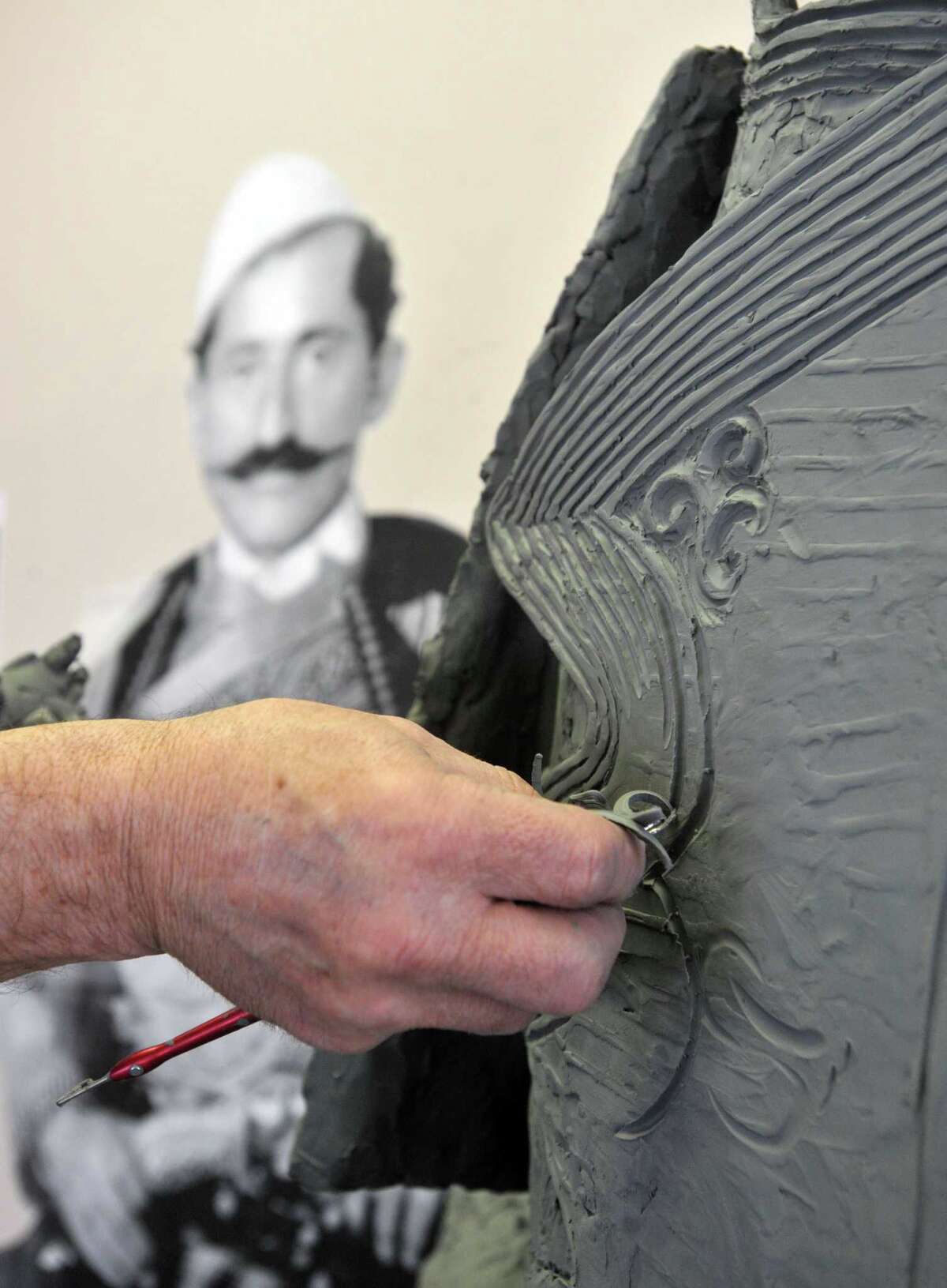 Photos of Vasil Rakaj Sculpting Memorial to Albanian Patriot, Derby