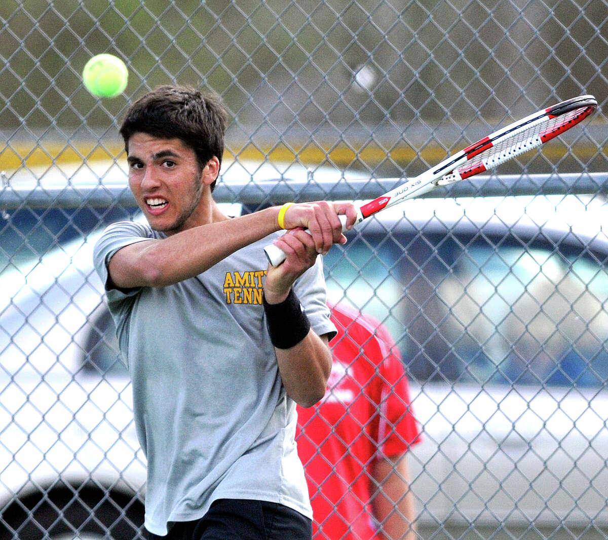 Photos: High school tennis 'big guns' battle it out.