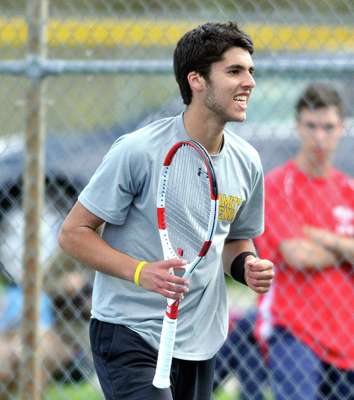 Photos: High school tennis 'big guns' battle it out.