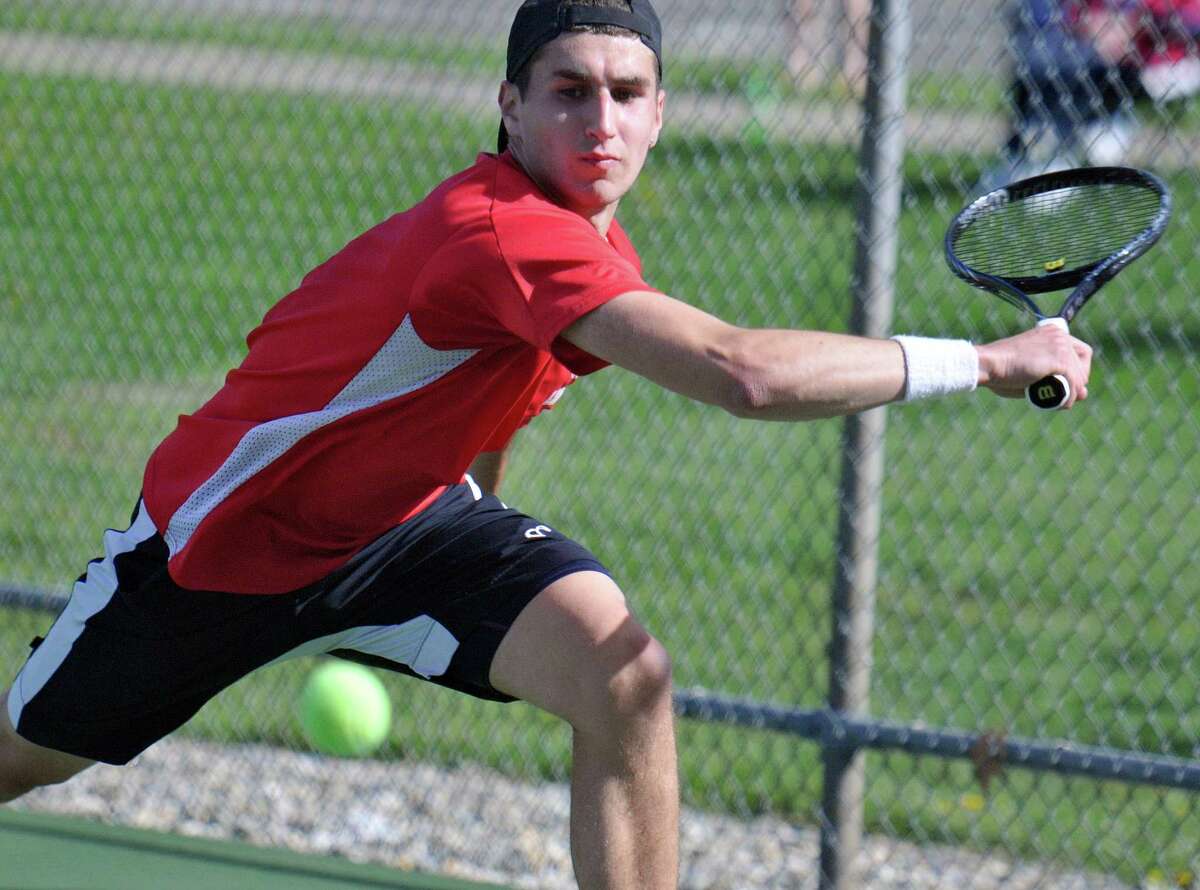 Photos: High school tennis 'big guns' battle it out.