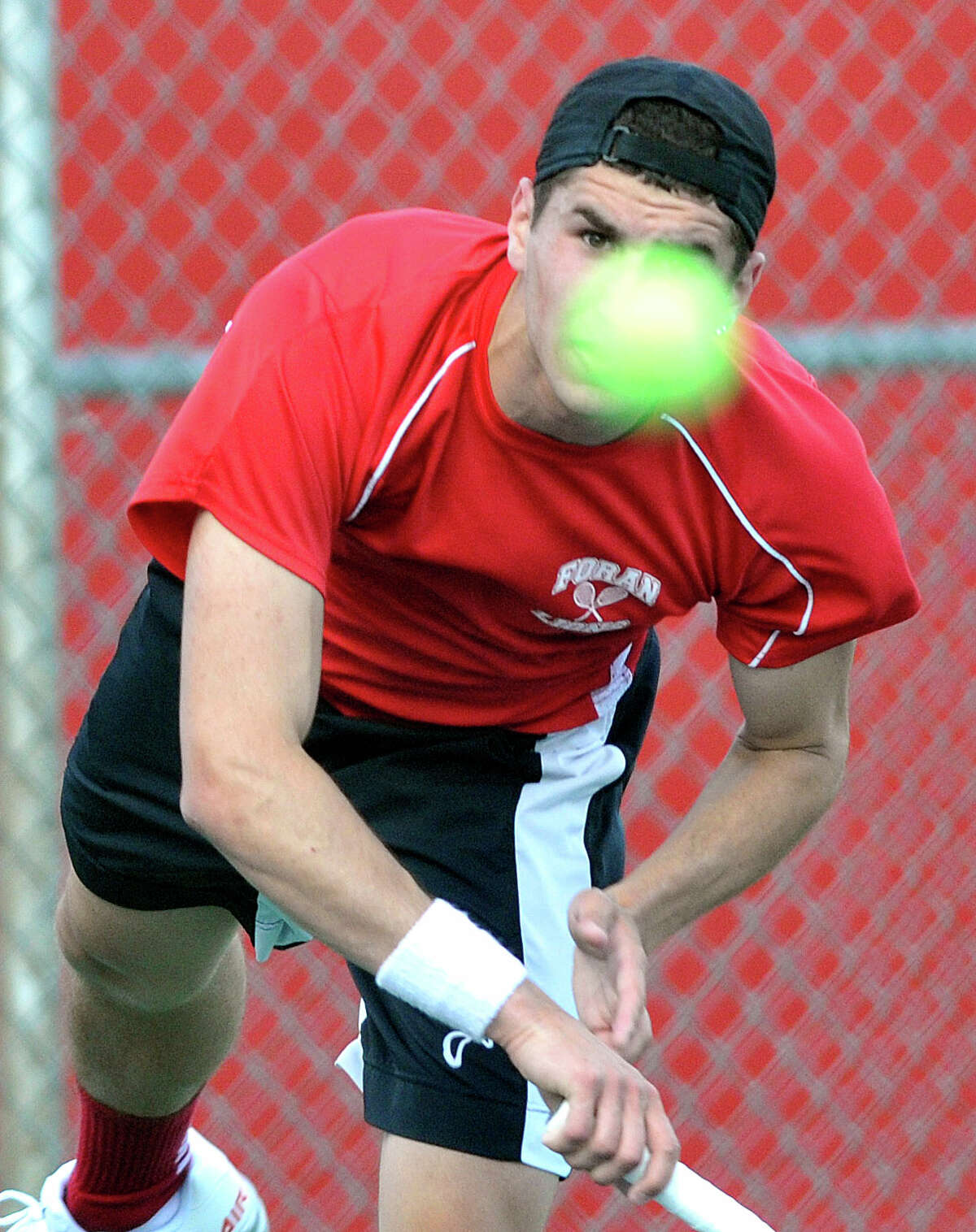 Photos: High school tennis 'big guns' battle it out.