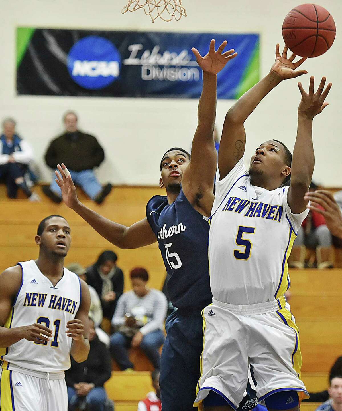 PHOTOS: SCSU Owls defeats UNH Chargers, 74-65