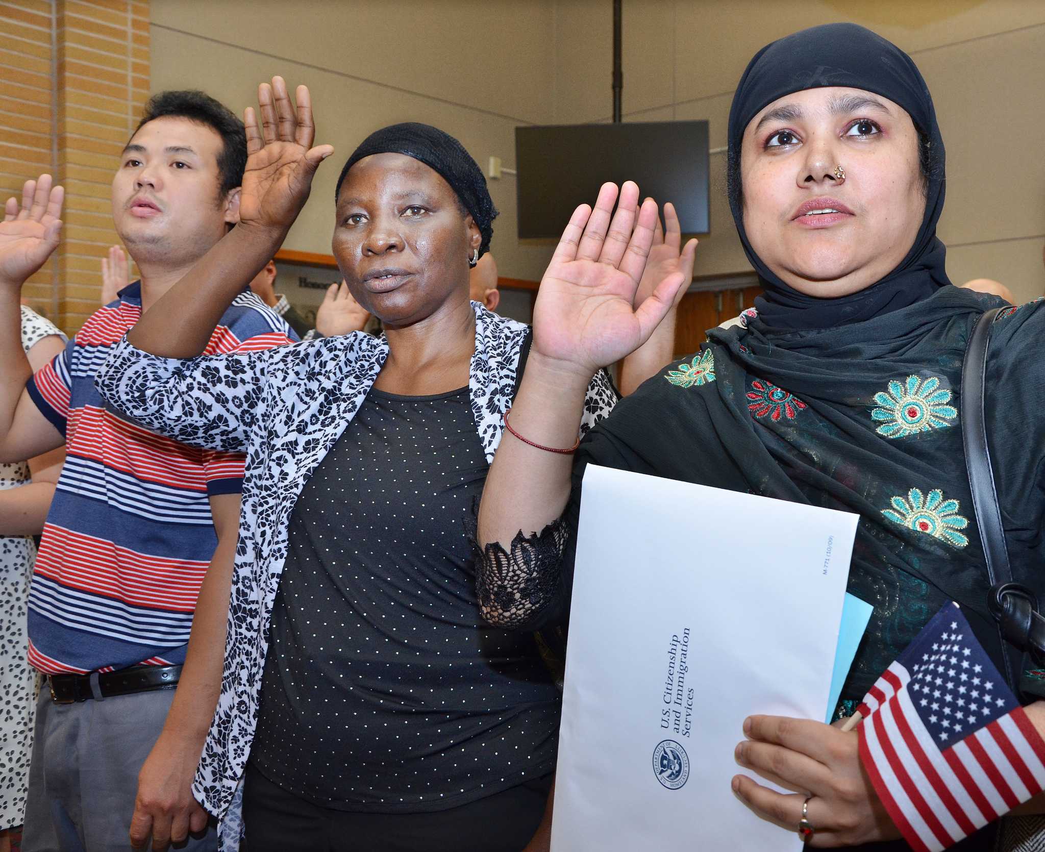 PHOTOS: Immigrants from 30 countries become U.S. citizens in Middletown