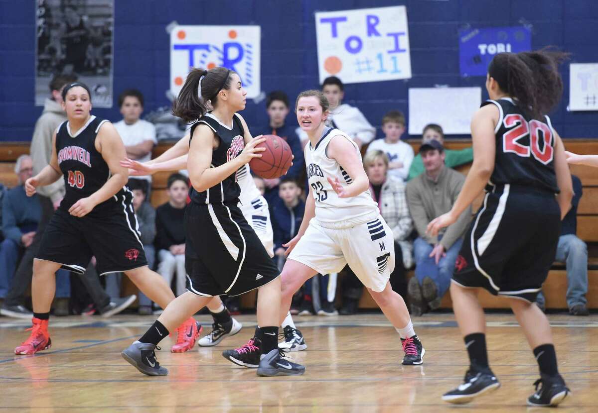 Photos of Morgan Girls Basketball Defeating Cromwell 45-42