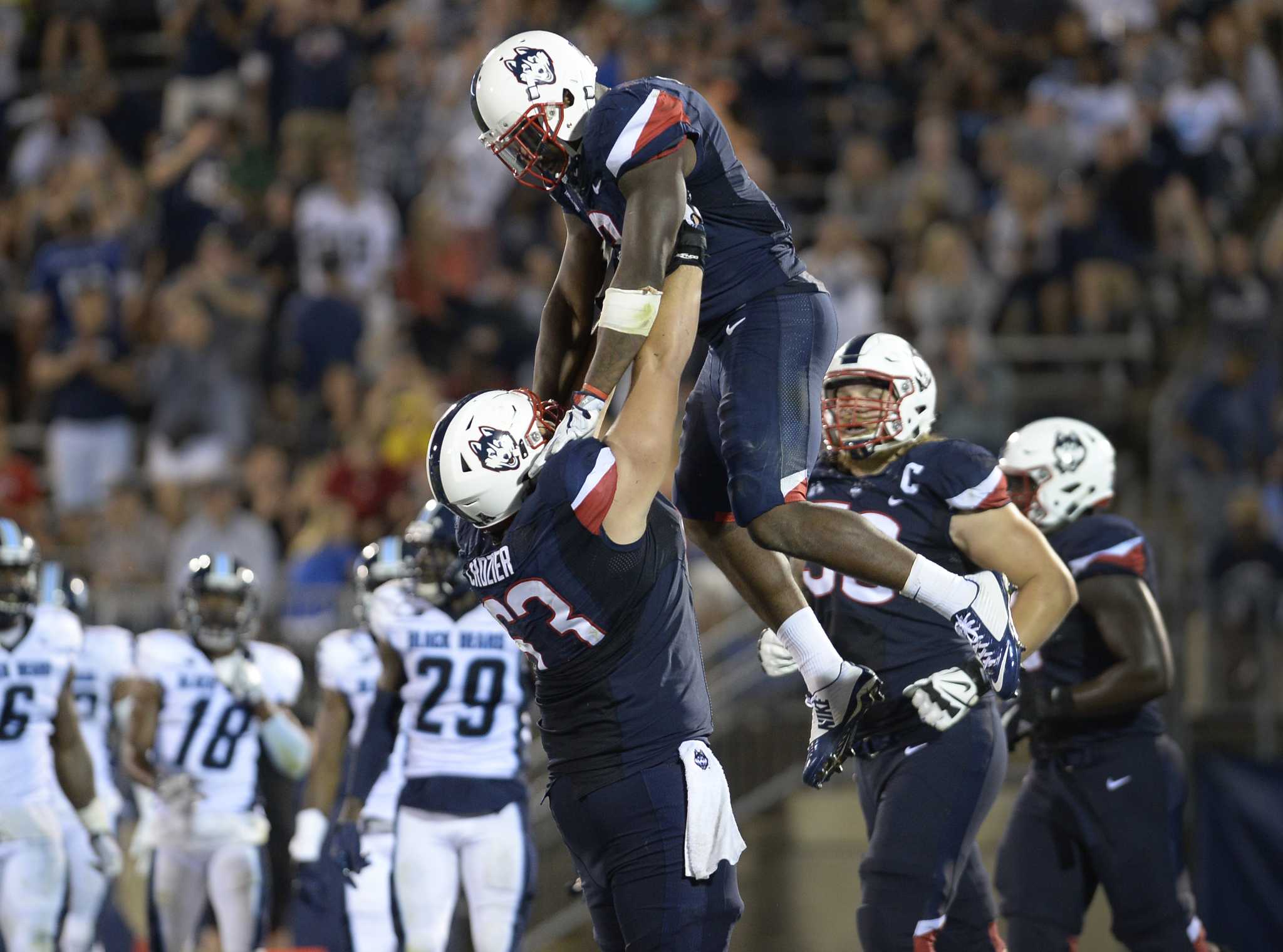 Photos: UConn football defeats Maine