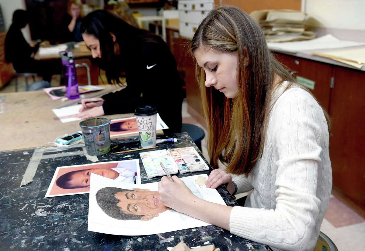 Photos of Memory Project Portraits at Amity High School