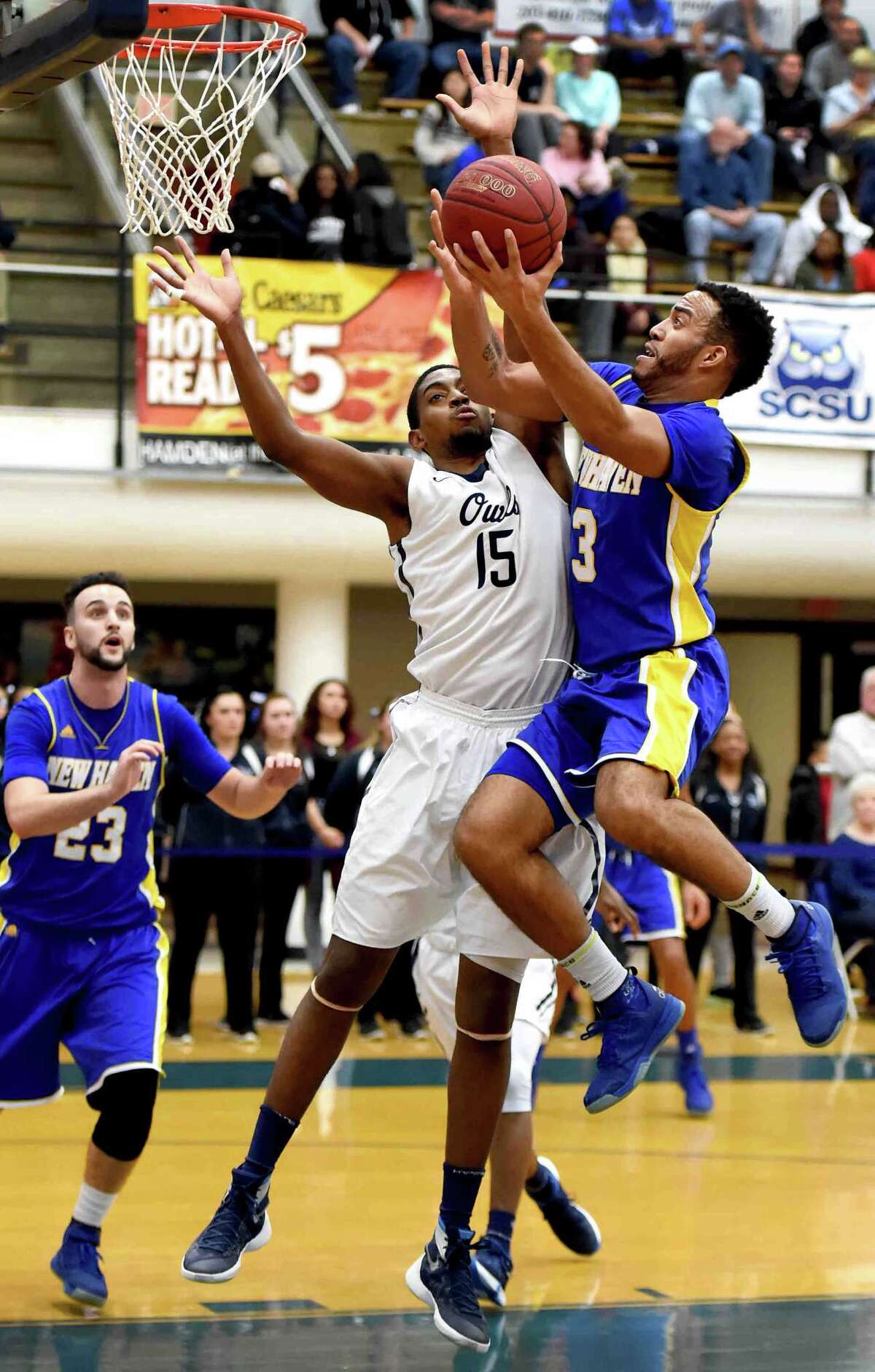 PHOTOS of SCSU Mens Basketball V. UNH