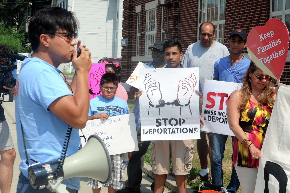Protesters say JPMorgan Chase profits from suffering of migrants