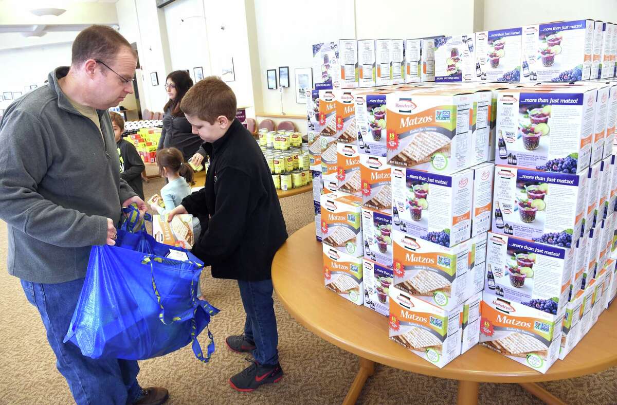 Photos of Project H.O.P.E. Passover Food Bags