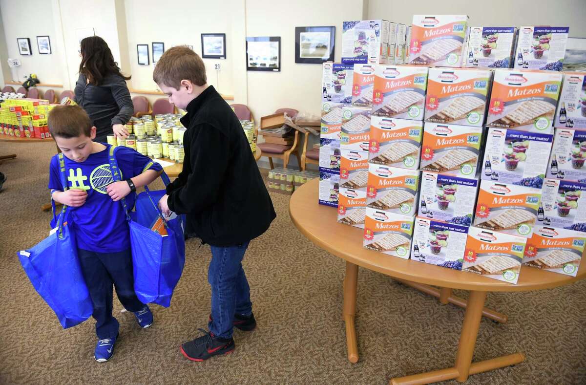 Photos of Project H.O.P.E. Passover Food Bags