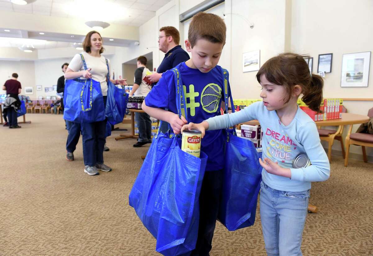 Photos of Project H.O.P.E. Passover Food Bags