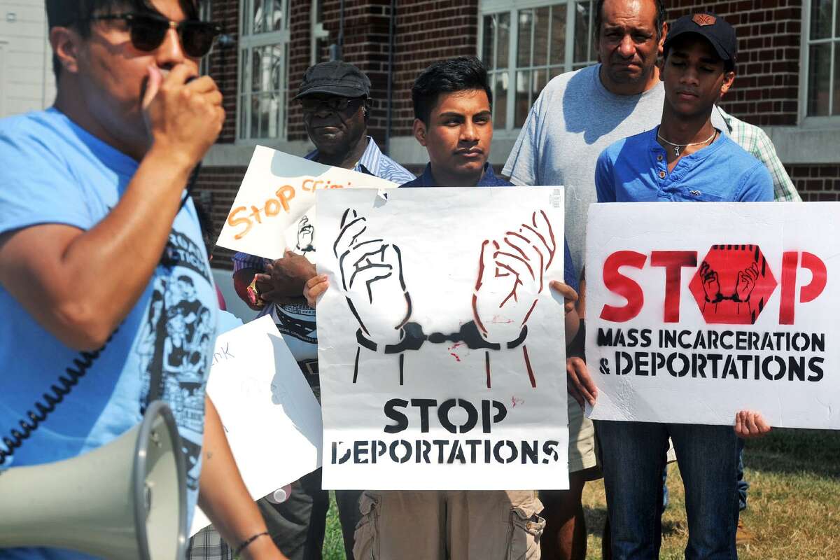 Protesters say JPMorgan Chase profits from suffering of migrants