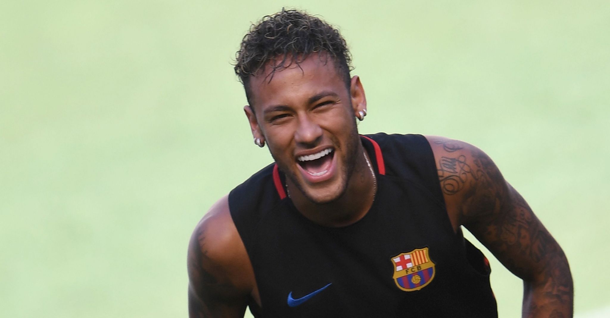 Neymar signs 5-year deal with PSG in world-record transfer