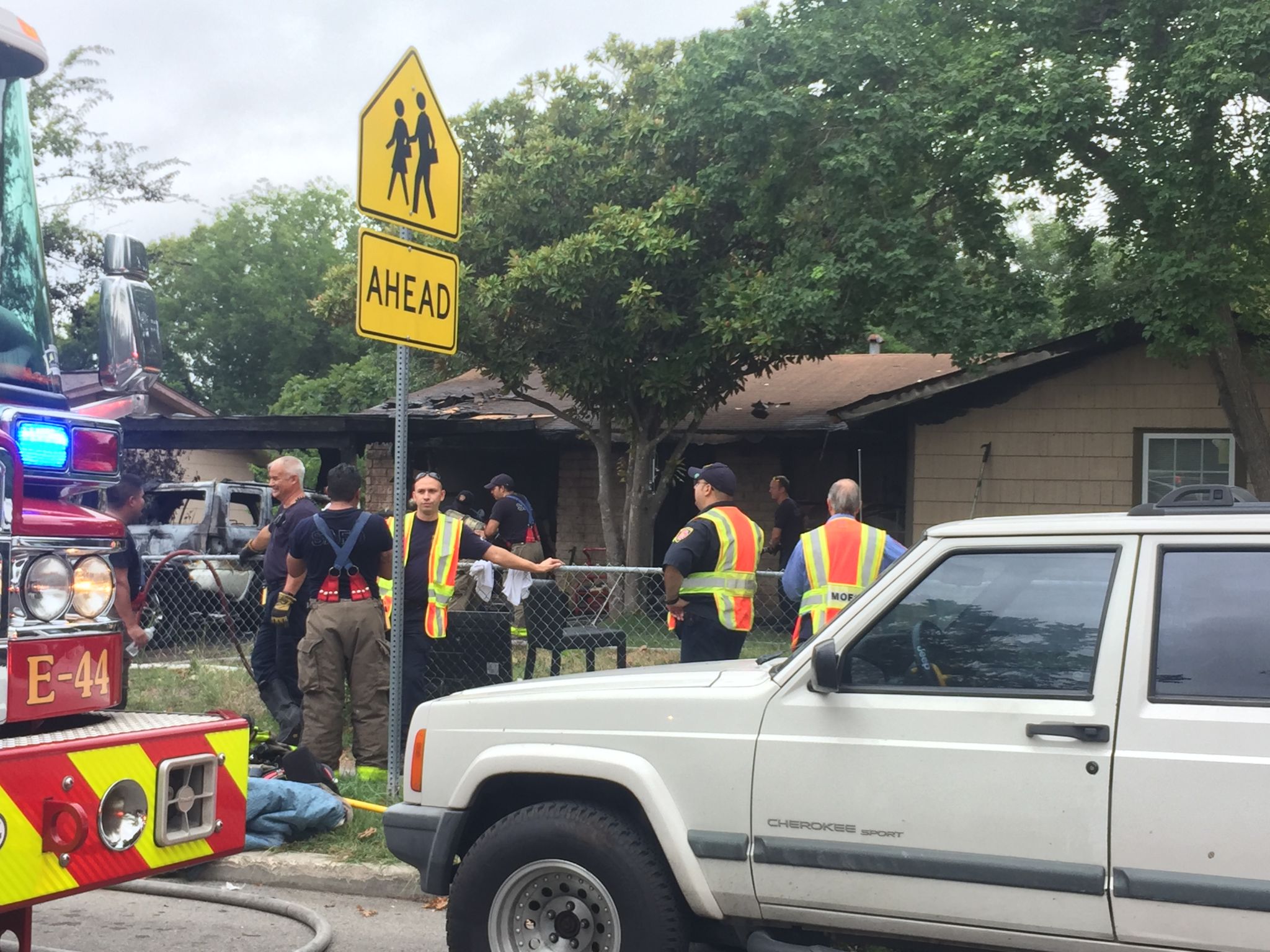 Vehicle fire spreads to home on far West Side