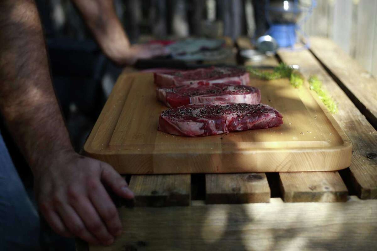 Cook your steaks caveman style directly on the coals - ExpressNews.com