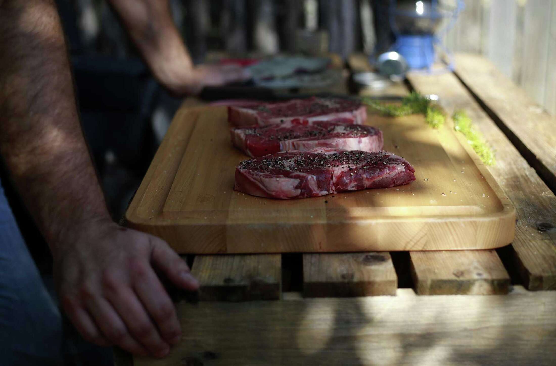 Cook your steaks caveman style directly on the coals