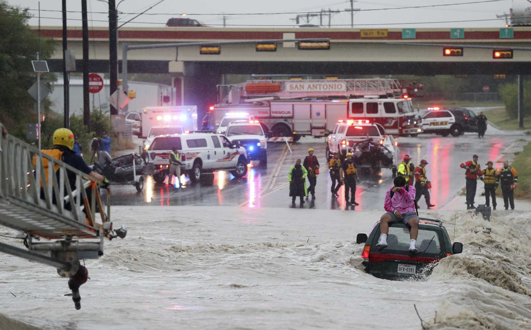 Record-breaking rainfall prompts rescues, evacuations
