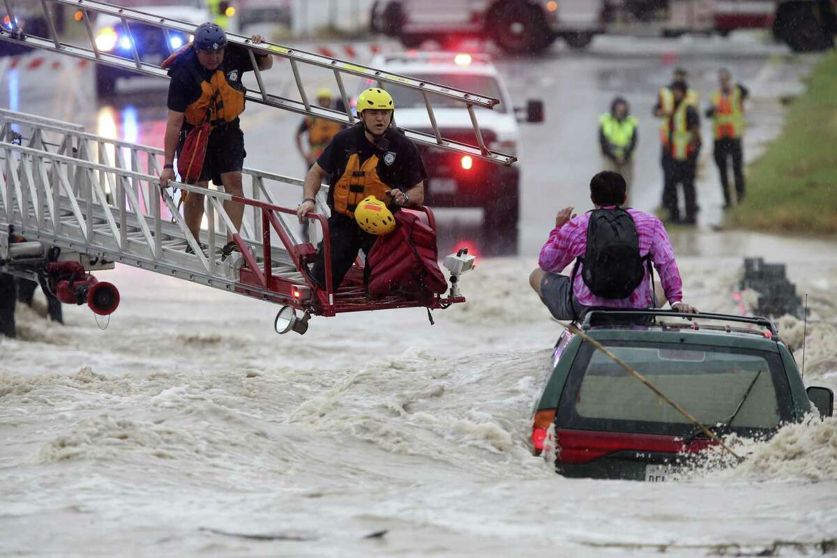 Photos show frame-by-frame look at driver's dramatic rescue from ...
