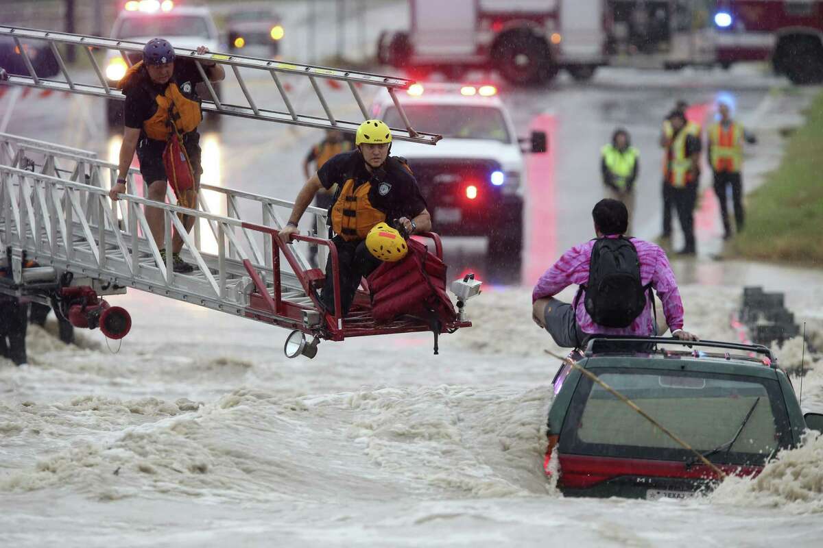 Photos show frame-by-frame look at driver's dramatic rescue from ...