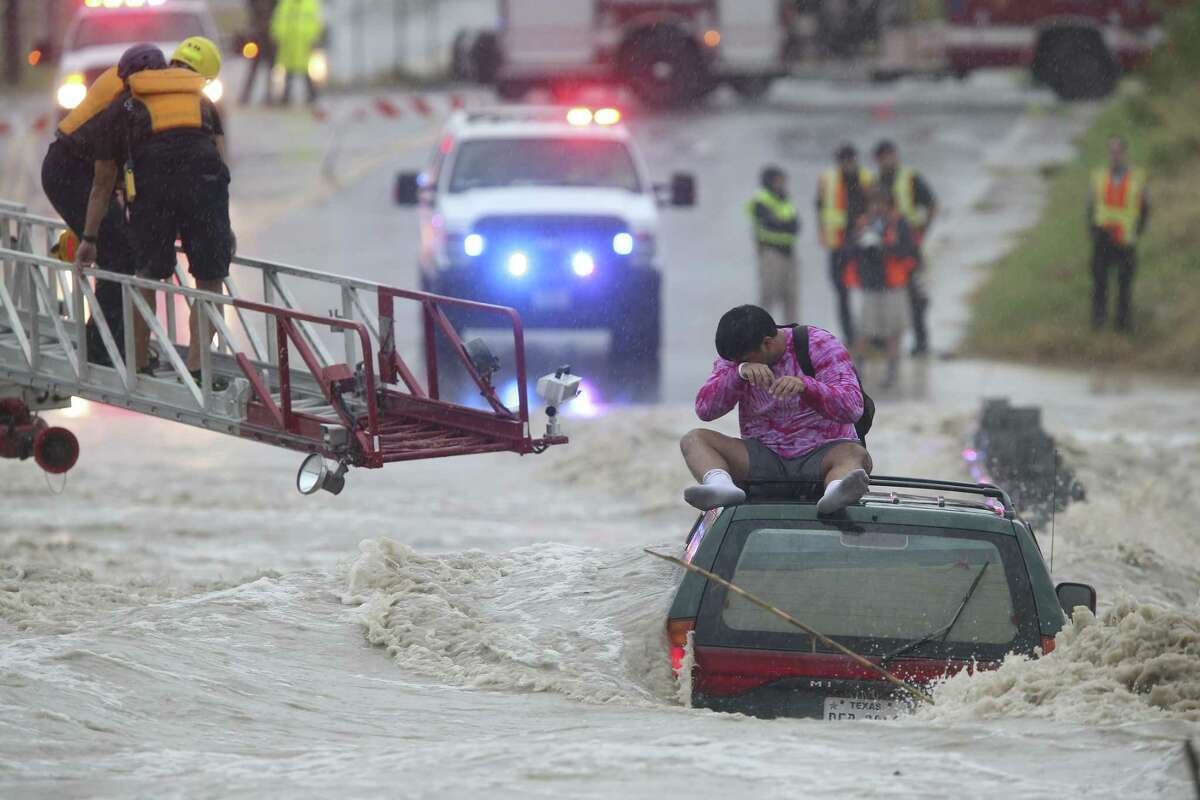 Photos show frame-by-frame look at driver's dramatic rescue from ...