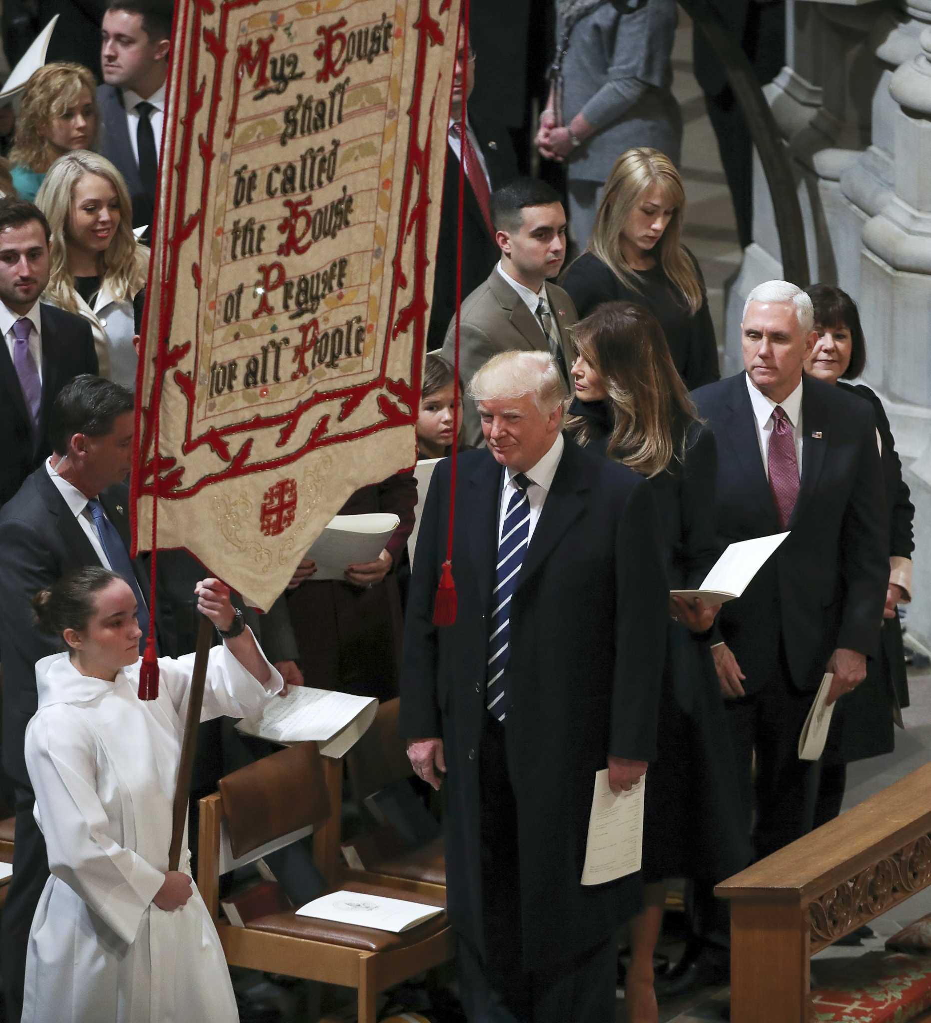 Trump opens first full day on job at church