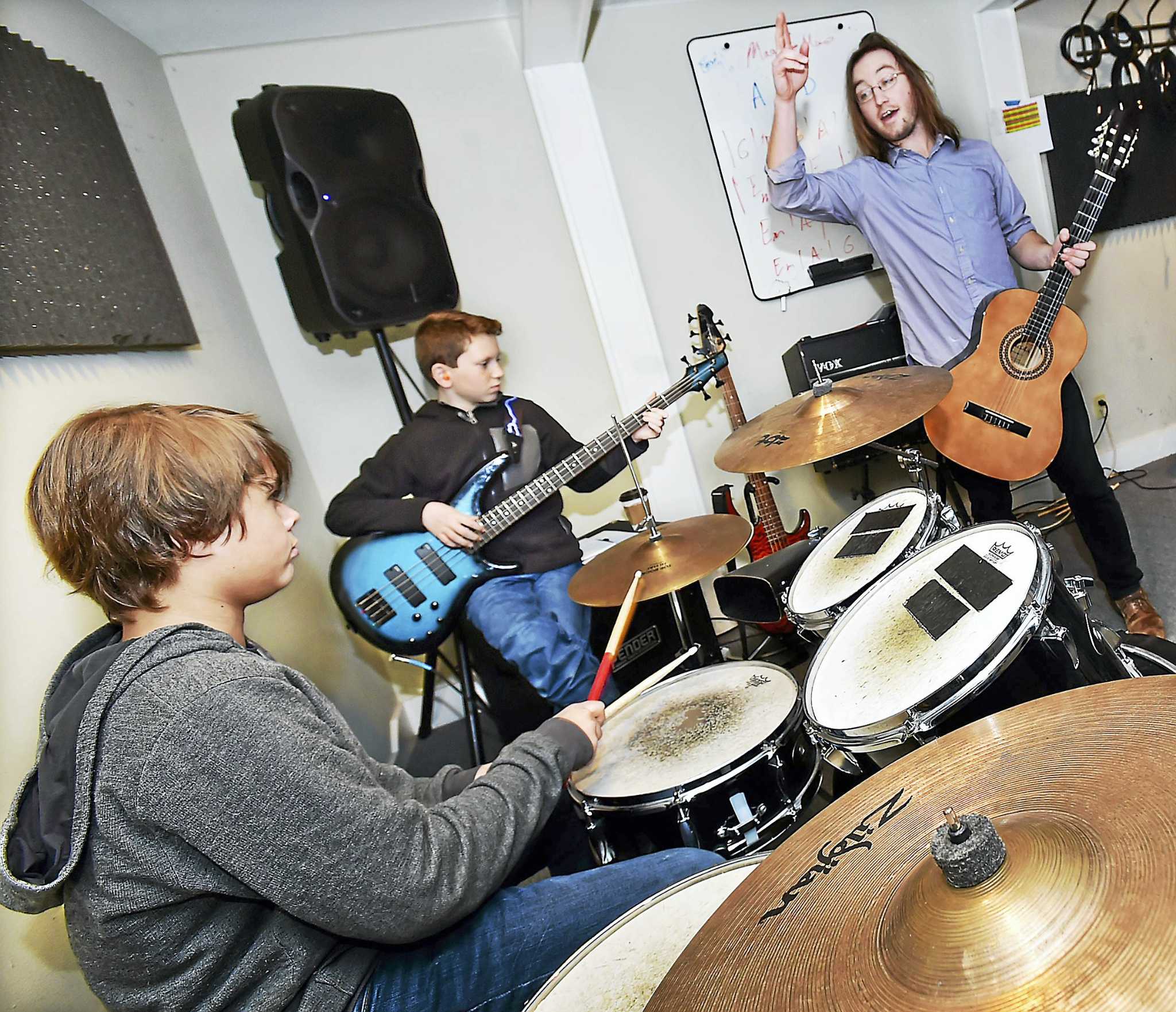 Students, adults alike hone music skills at Madison’s School of Rock