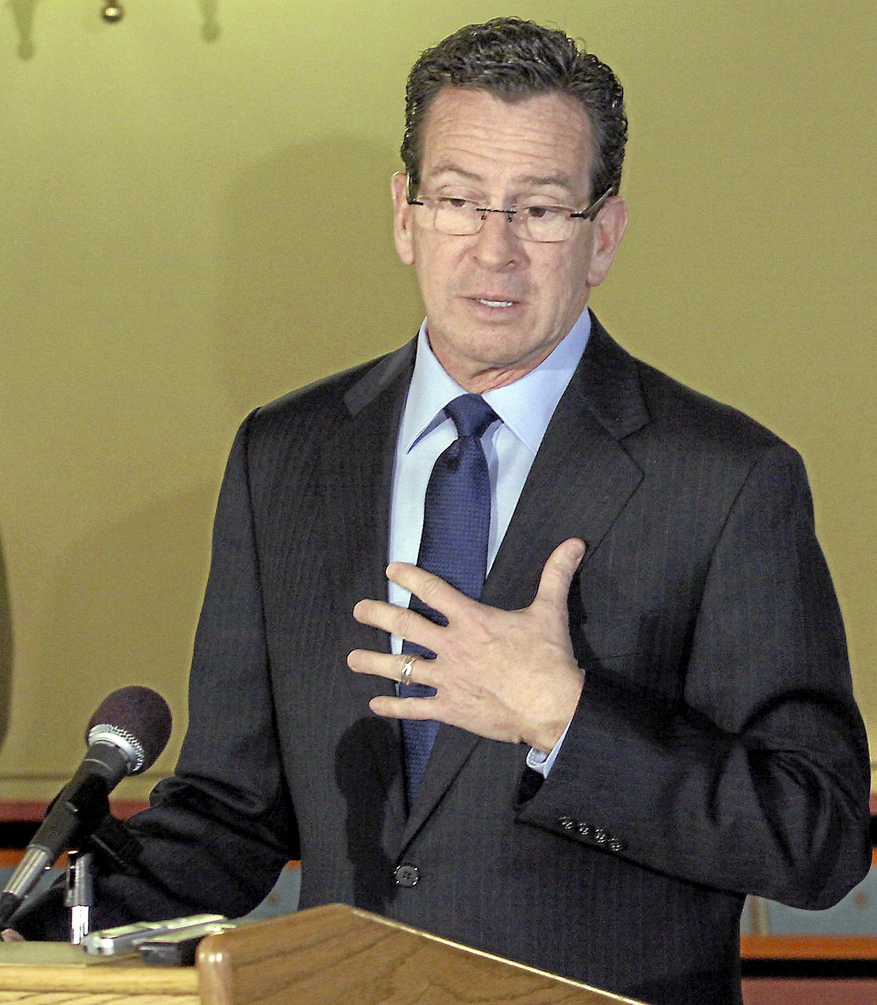 Malloy budget plan for Connecticut aims cuts at living and dead