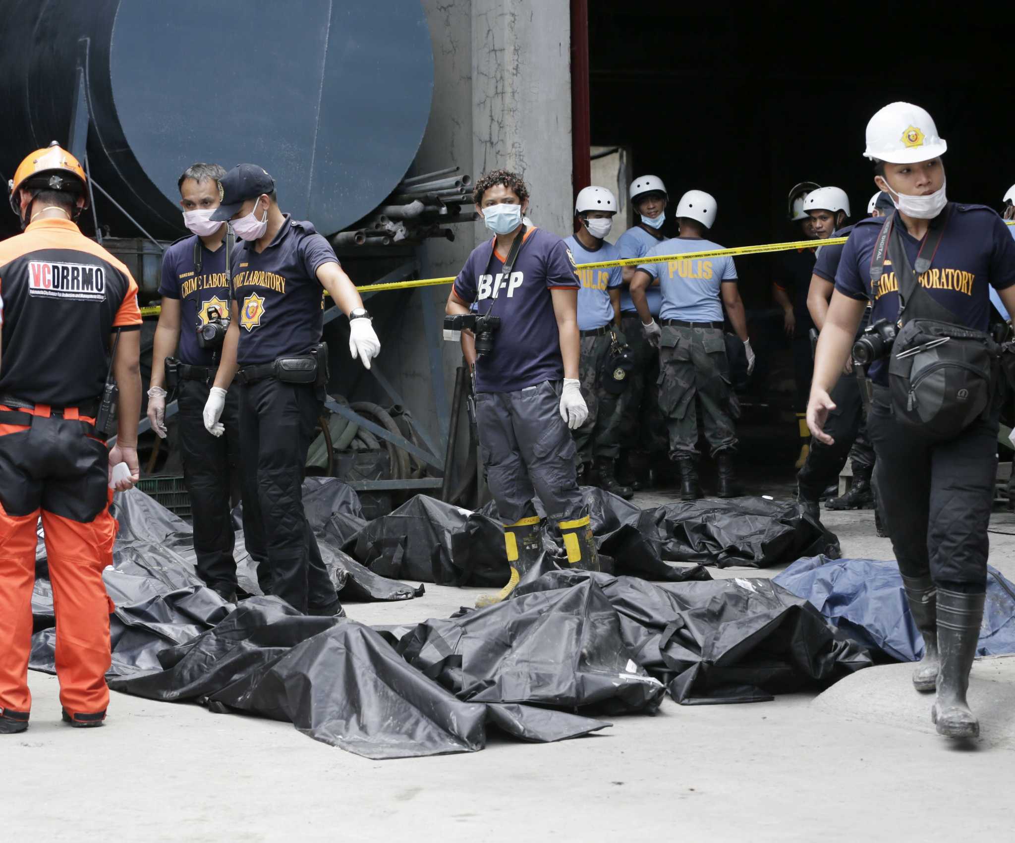 Philippine police investigating factory fire that killed 72