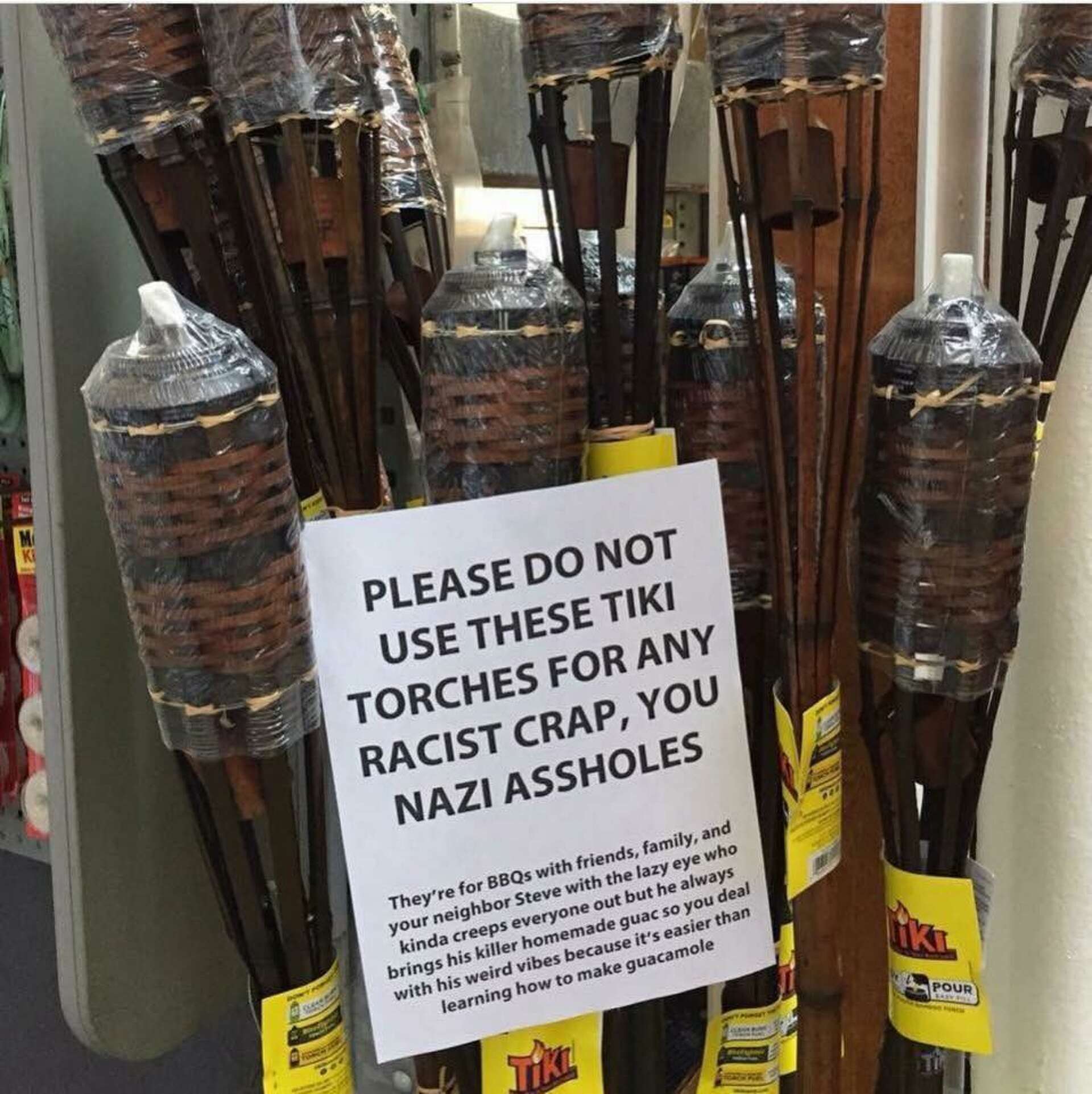 The full story behind the viral tiki torch sign photo