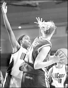 Accent is on her game; Australian Hibbert does it all for Lady Tigers