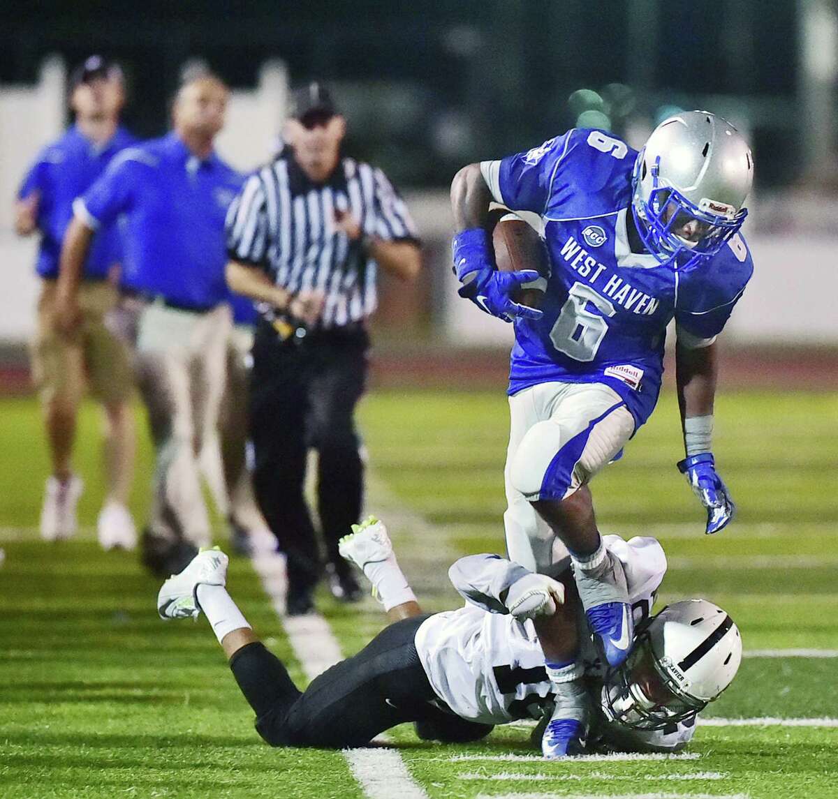 PHOTOS: Football: Westies defeat Xavier, 35-27, in season opener