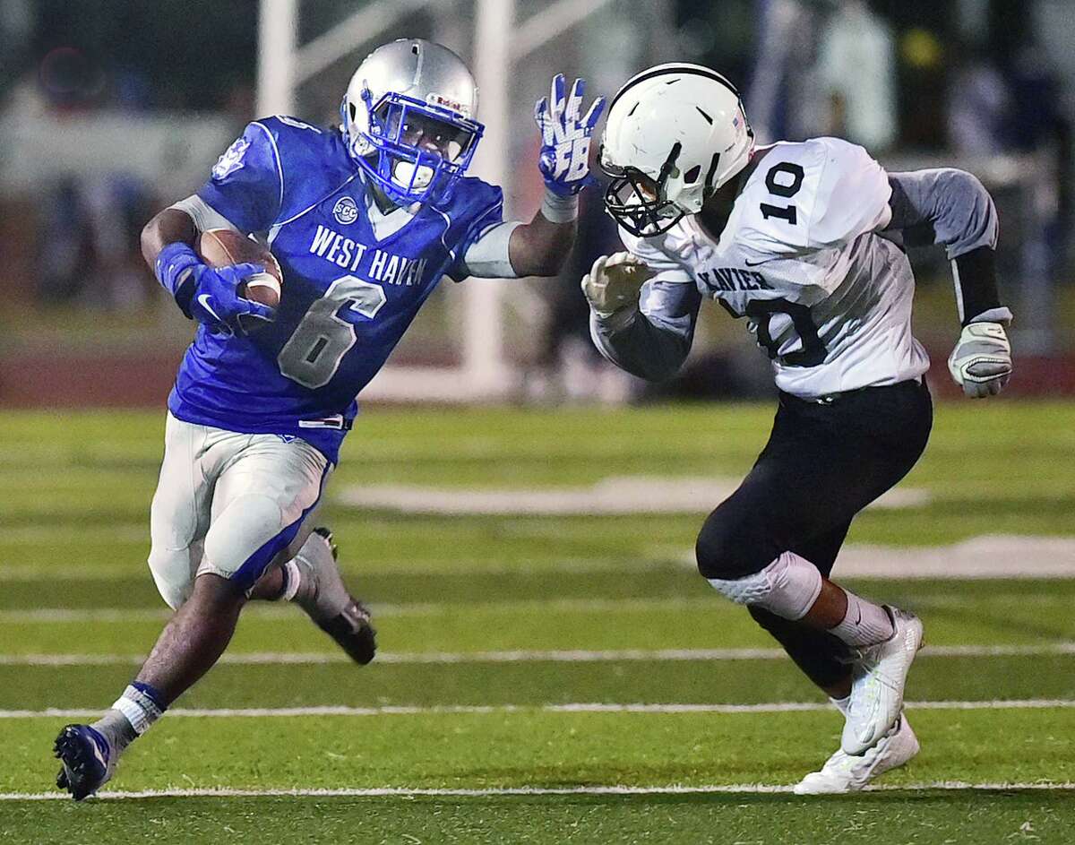 PHOTOS: Football: Westies defeat Xavier, 35-27, in season opener