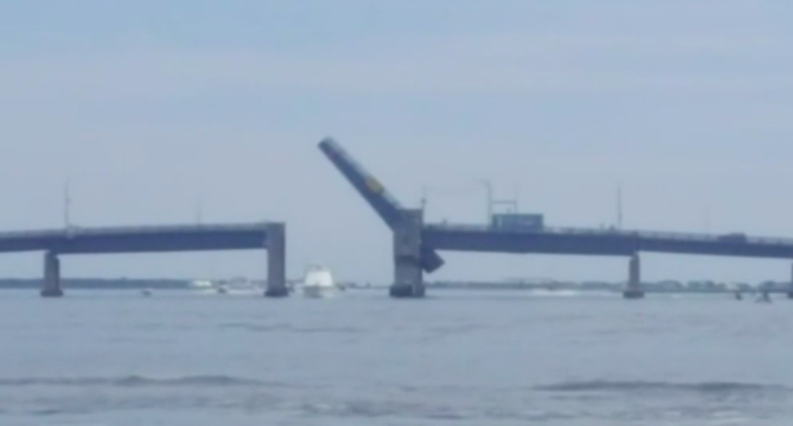 Man guns engine when drawbridge starts to rise